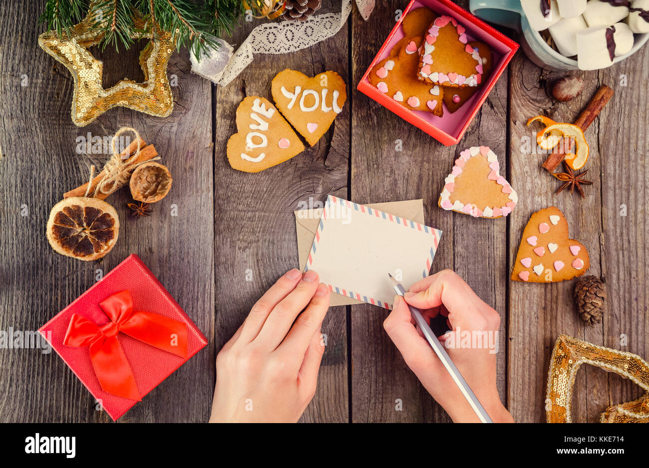 Hands writing love on card hi-res stock photography and images - Alamy