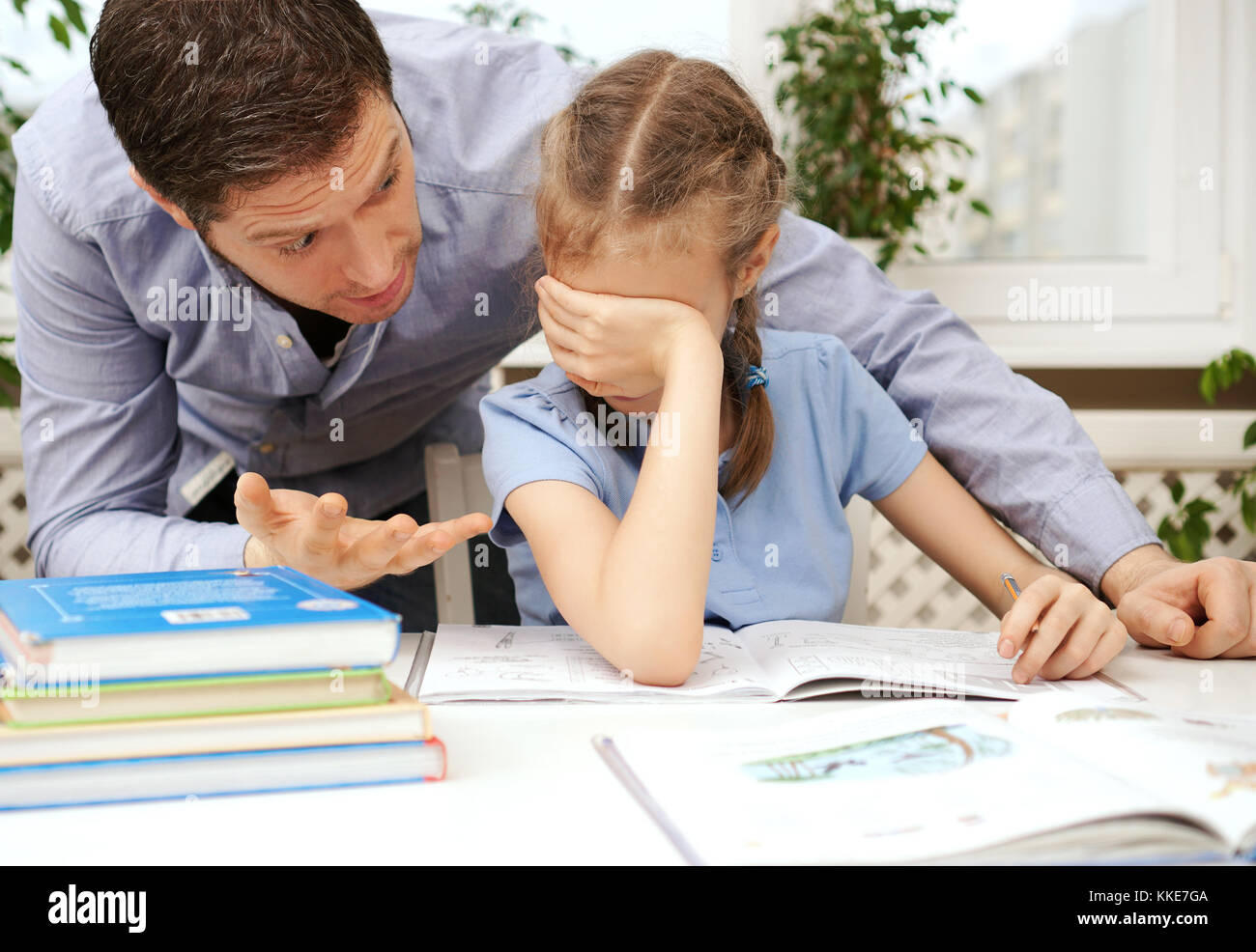 Scared child and angry father hi-res stock photography and images - Alamy