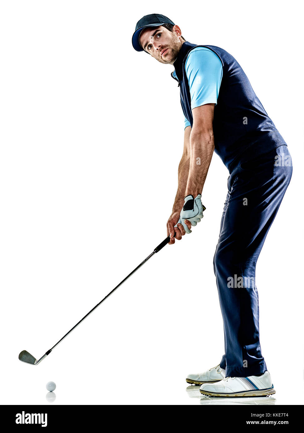 one caucasian man golfer golfing in studio isolated on white background ...