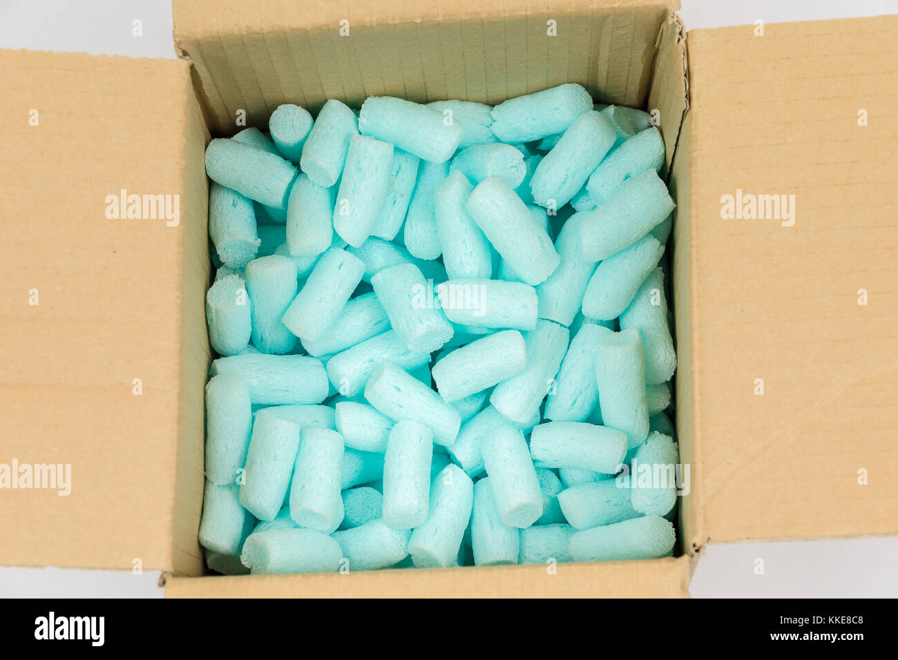 Box filled with blue styrofoam pellets Stock Photo - Alamy