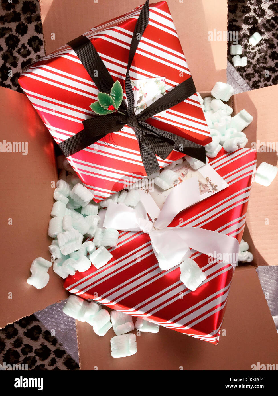 Wrapped Christmas Presents in Packing Box, USA Stock Photo - Alamy