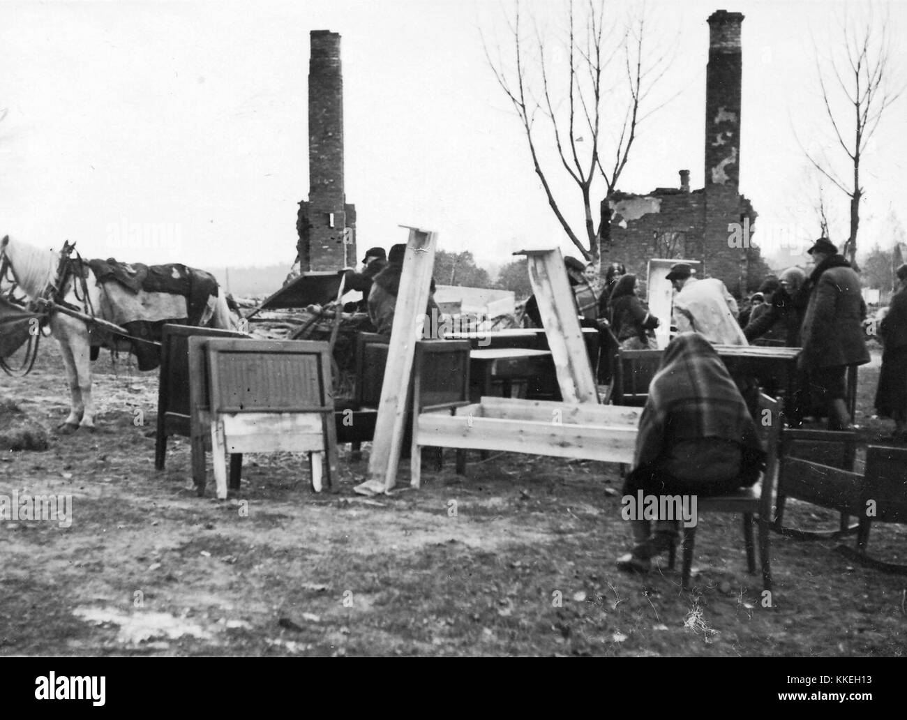 This image depicts a historical scene from Poland during World War II ...