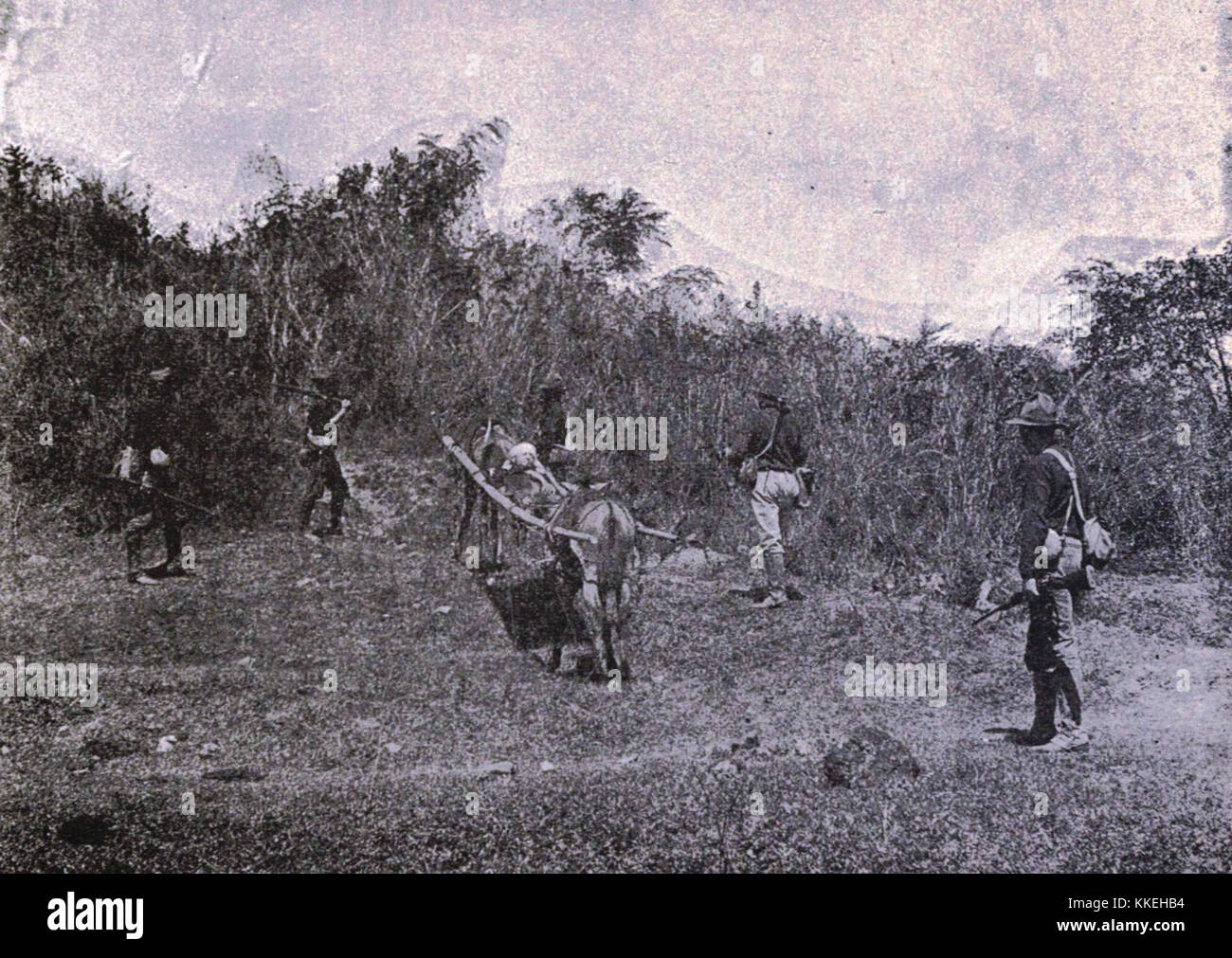 A historical photograph showing a wounded American soldier being ...