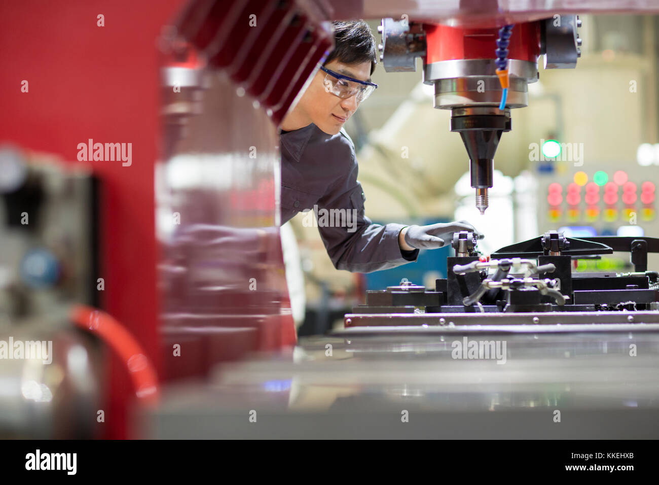 Young Chinese engineer working in the factory Stock Photo - Alamy