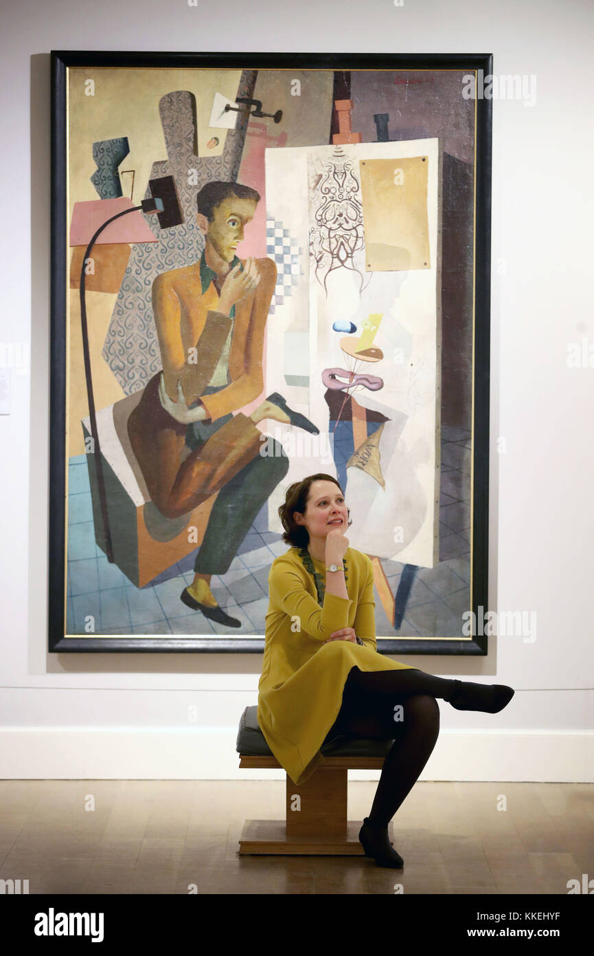 Senior curator Alice Strang sits alongside a painting titled Womb From ...