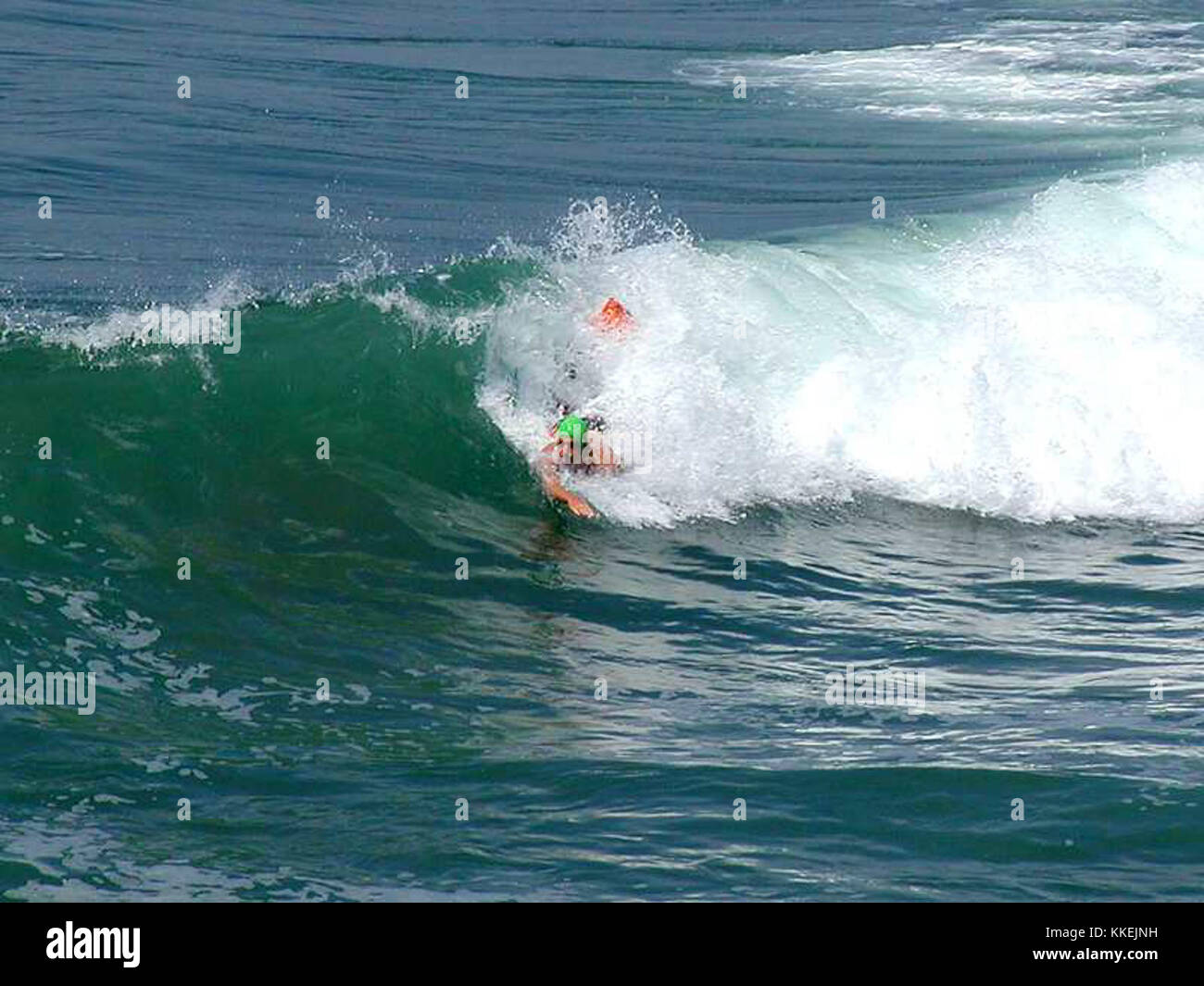 Bodysurfing is a water sport that involves riding waves without the use ...