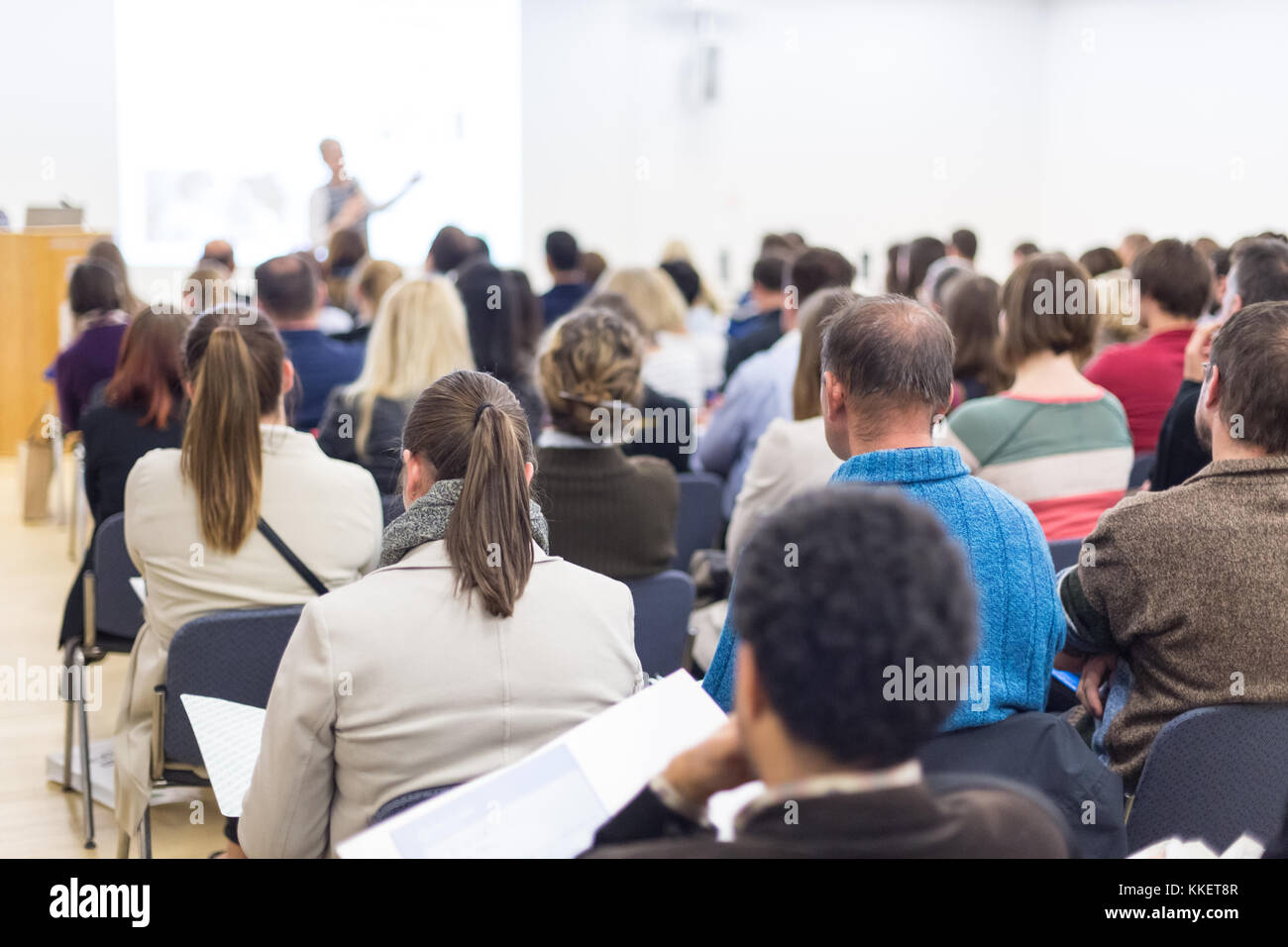 Woman giving presentation on business conference Stock Photo - Alamy