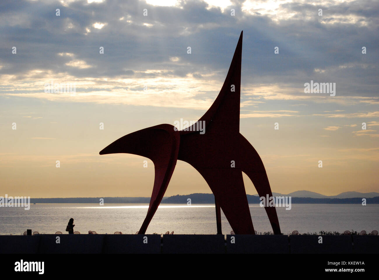 This photograph features the famous Calder Eagle sculpture at sunset ...