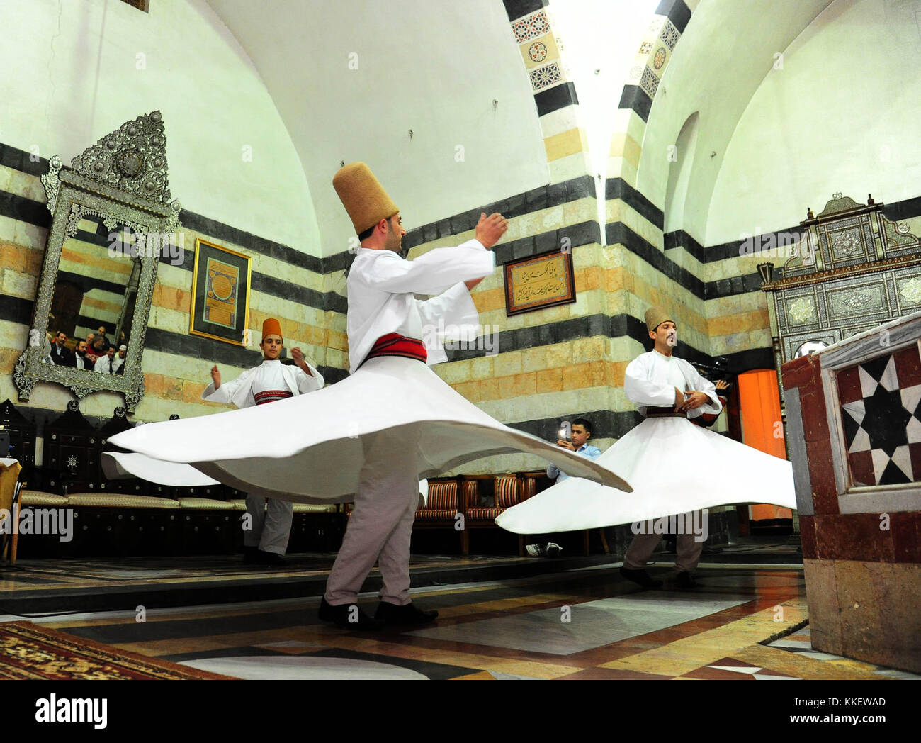 Damascus, Syria. 30th Nov, 2017. Syrian men perform Sufi dance for the ...