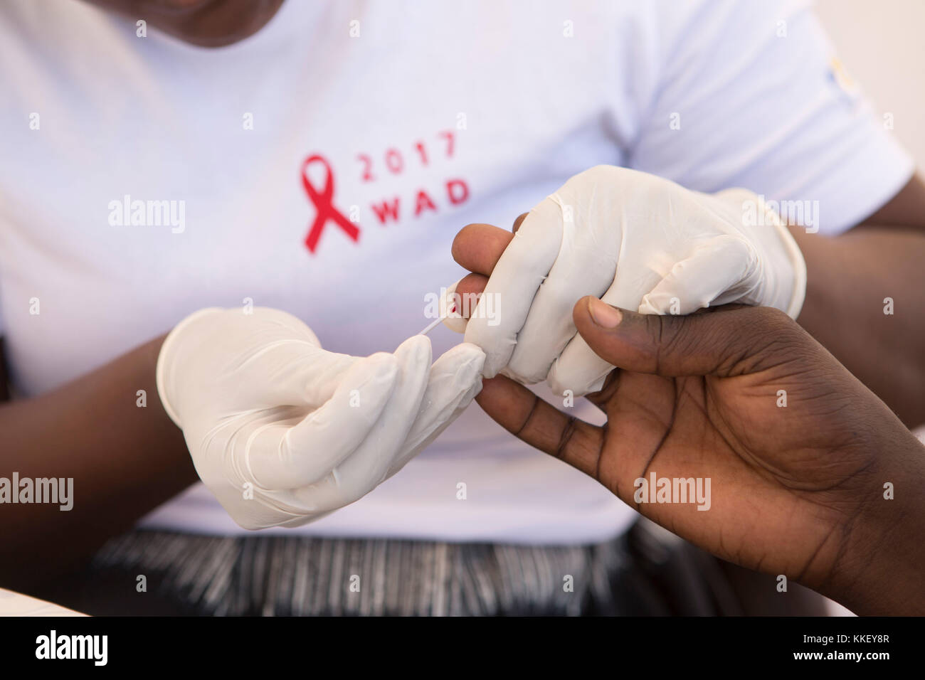 Kigali, Rwanda. 1st Dec, 2017. A person receives a free HIV test during ...