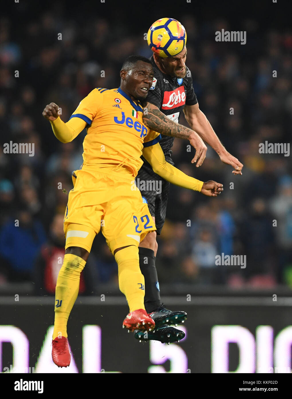 Naples, Italy. 1st Dec, 2017. Juventus' Christian Maggio (L) competes ...