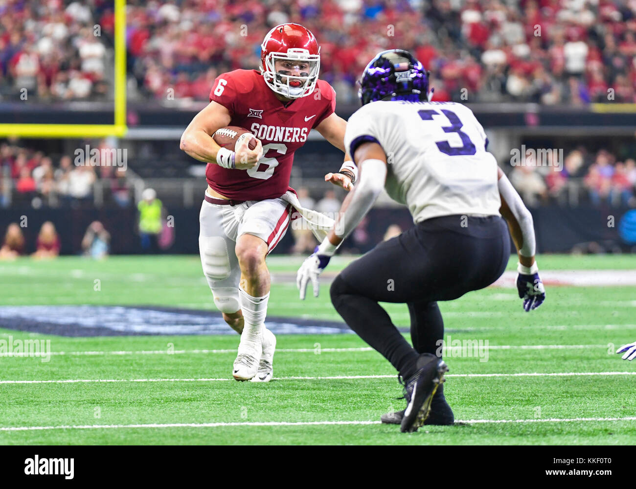 December 02, 2017: Oklahoma Sooners quarterback Baker Mayfield #6 carries the ball to set up a ...