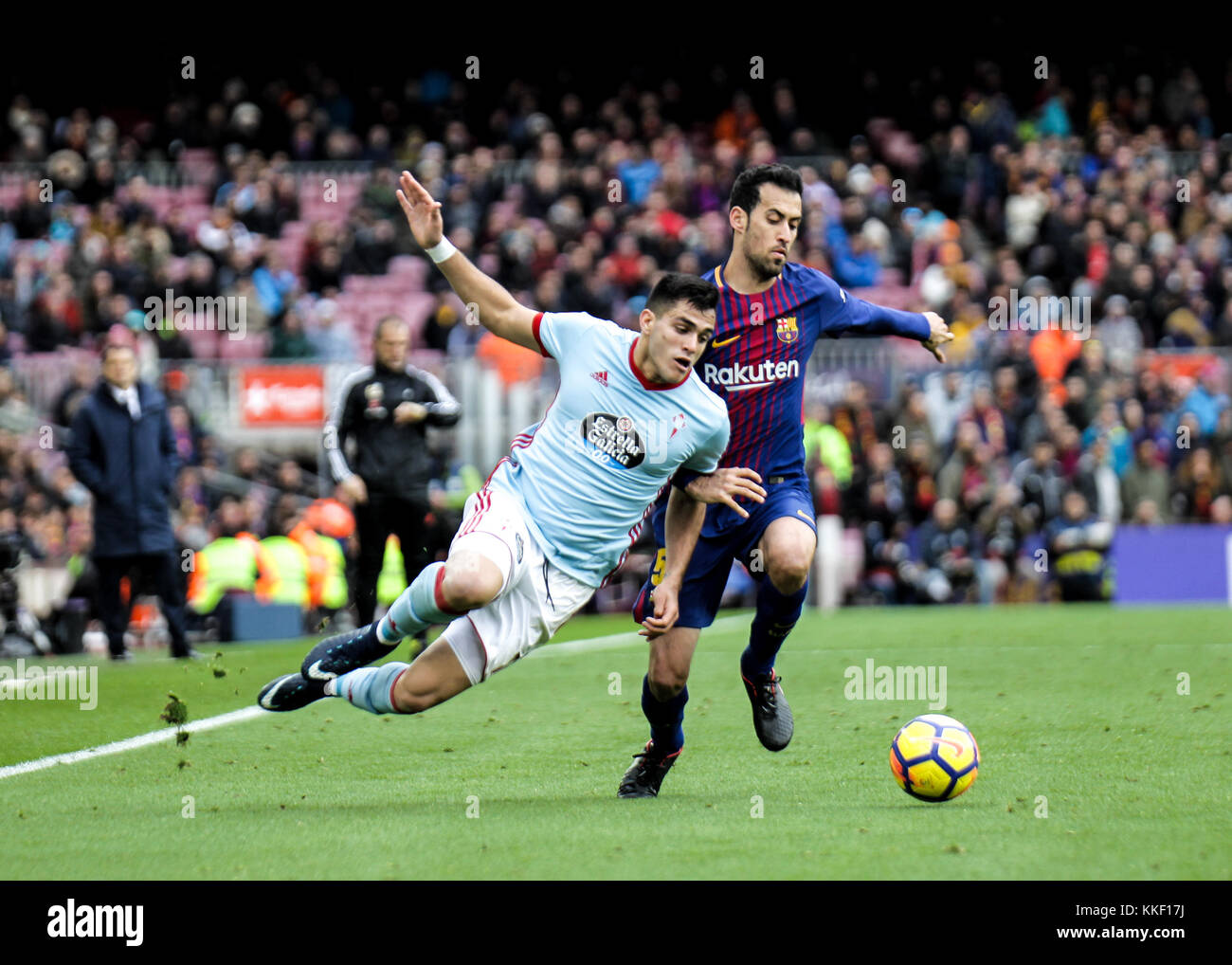 Soccer players Maxi Gomez and Sergio Busquets during the match between ...