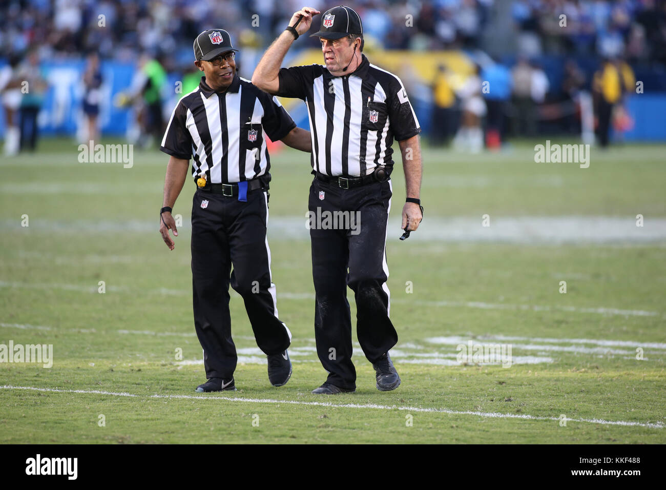Carson, CA. 03rd Dec, 2017. Back Judge checking on Umpire Jeff Rice (R ...