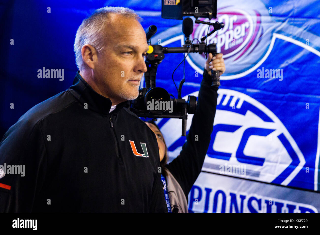 Charlotte, NC, USA. 2nd Dec, 2017. Miami head coach Mark Richt enters ...