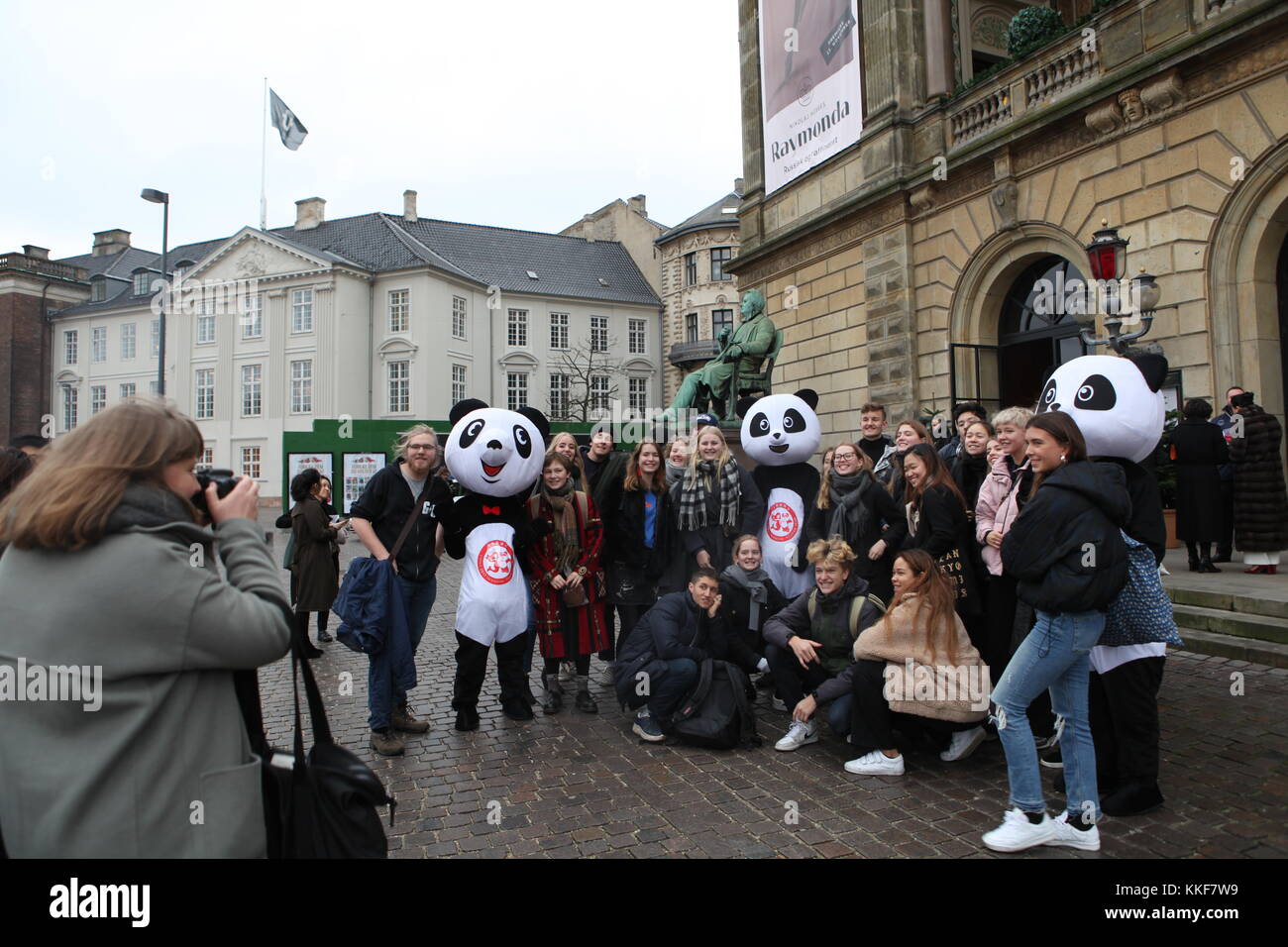 Copenhagen, Denmark. 5th Dec, 2017. People pose with panda mascots ...