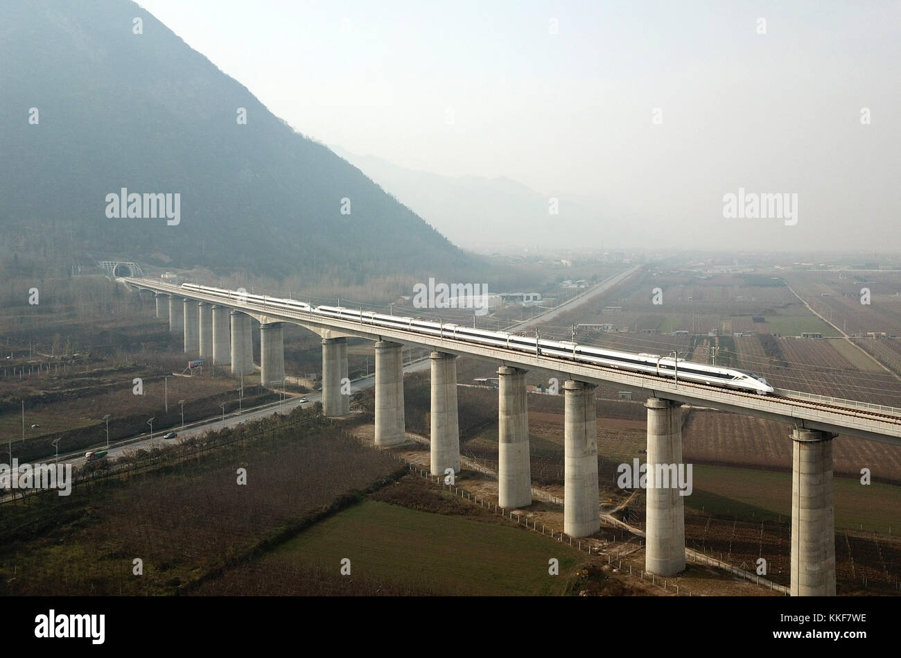 Xi'an, China's Shaanxi Province. 6th Dec, 2017. A bullet train runs on ...
