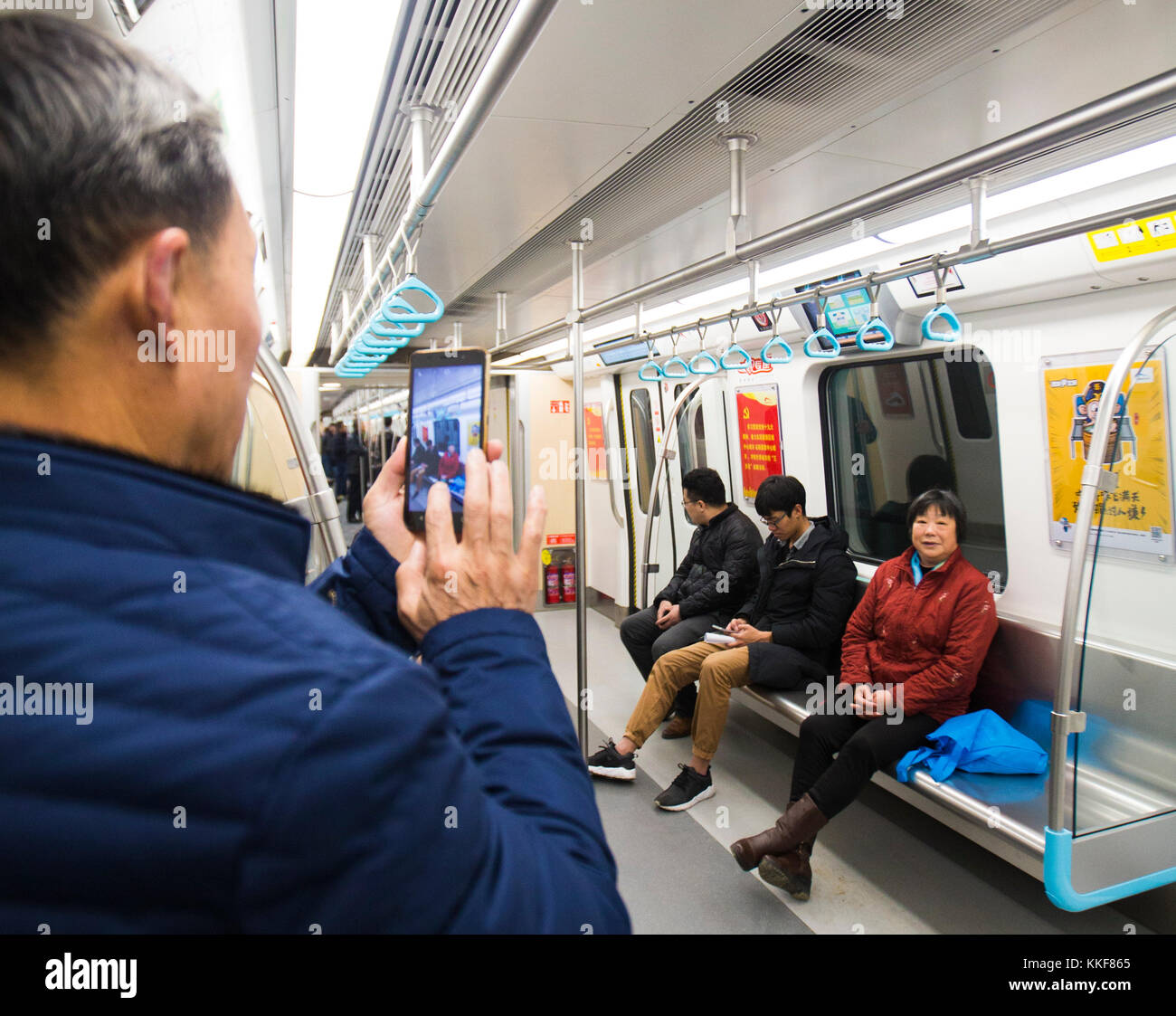 Chengdu, China's Sichuan Province. 6th Dec, 2017. Passengers take ...