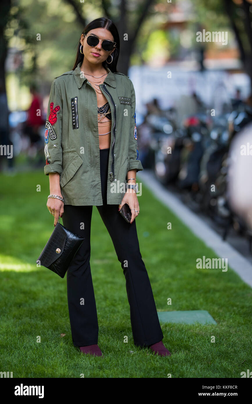 Milan, Italy - September 22, 2017: Girl in a fashionable outfit posing ...