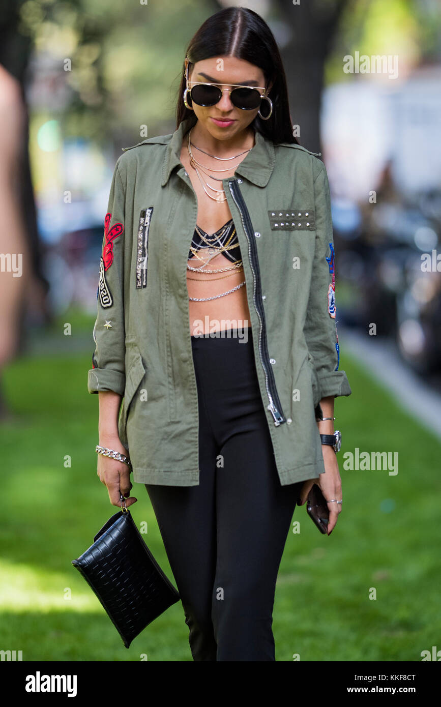 Milan, Italy - September 22, 2017: Girl in a fashionable outfit posing ...