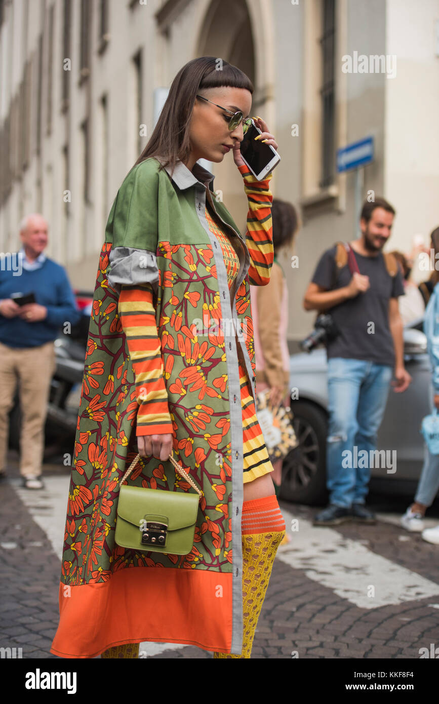 Milan, Italy - September 22, 2017: Girl in a fashionable outfit posing ...
