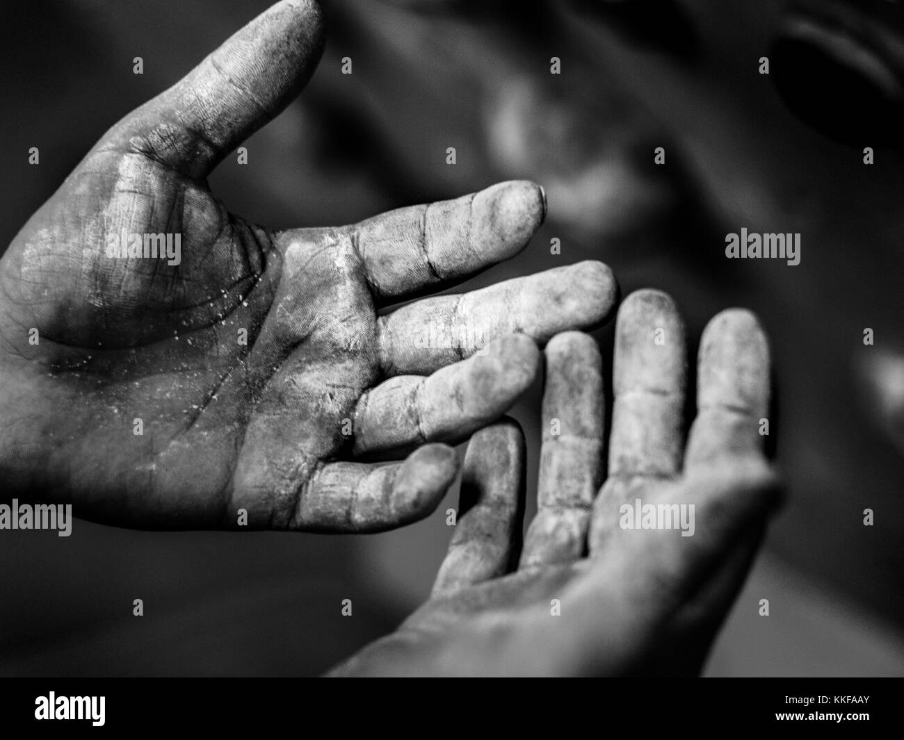 side view of the both palms of a male. Black and white photograph of ...
