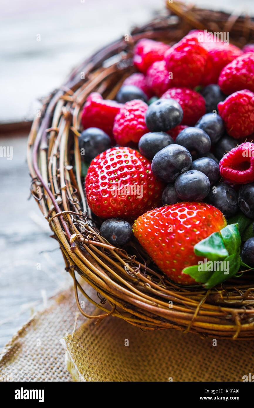 Berries on wooden background Stock Photo - Alamy