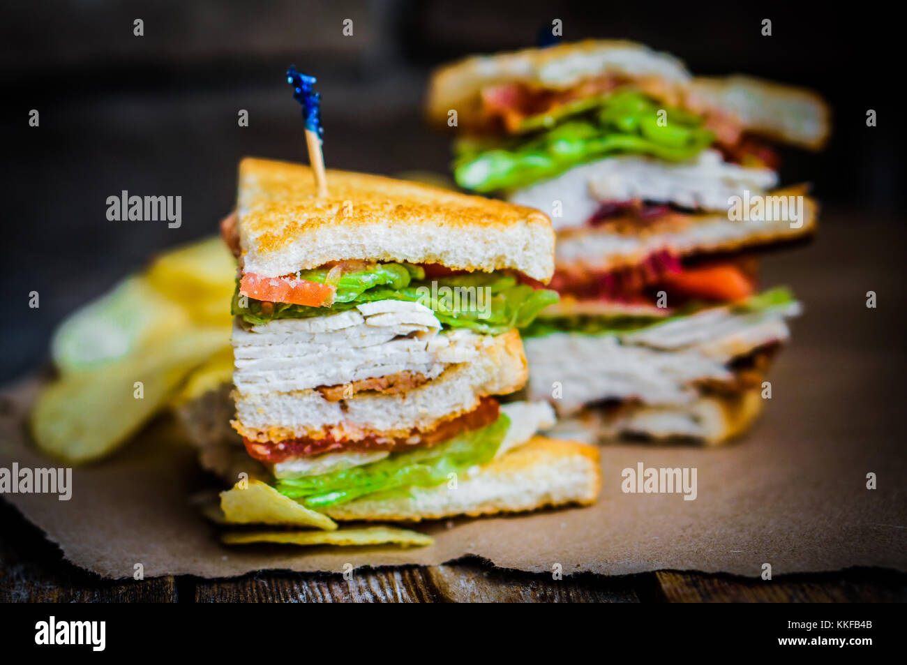 Club Sandwich On Rustic Wooden Background Stock Photo - Alamy