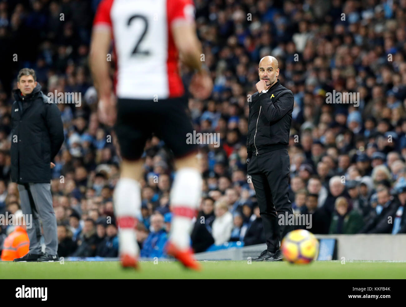 Manchester City manager Pep Guardiola looks on from the touchline ...