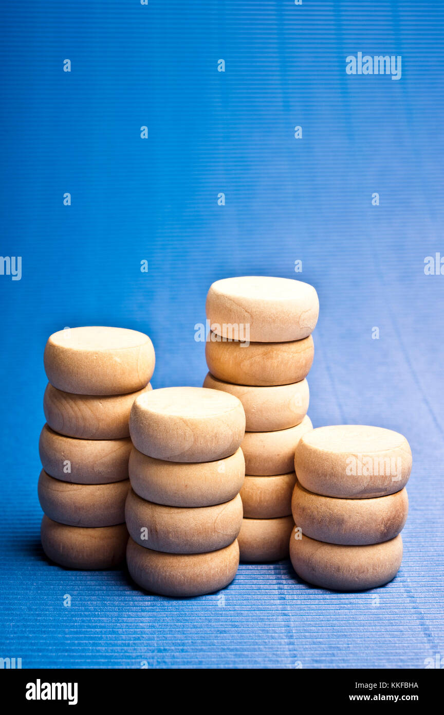 stacks of wooden round pieces, growth concept Stock Photo - Alamy