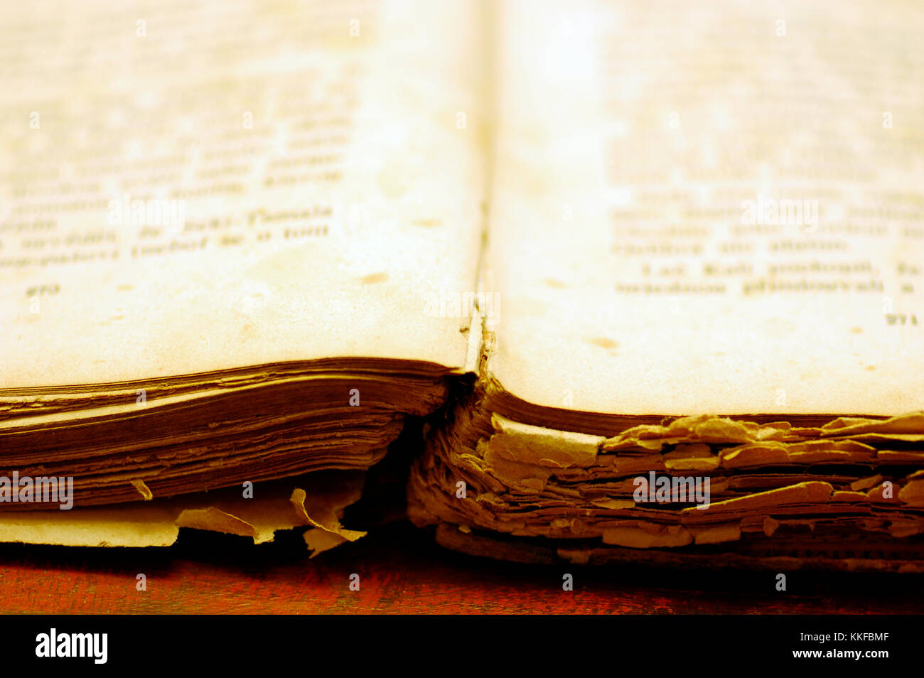 close up of a very old and damaged book, opened Stock Photo - Alamy
