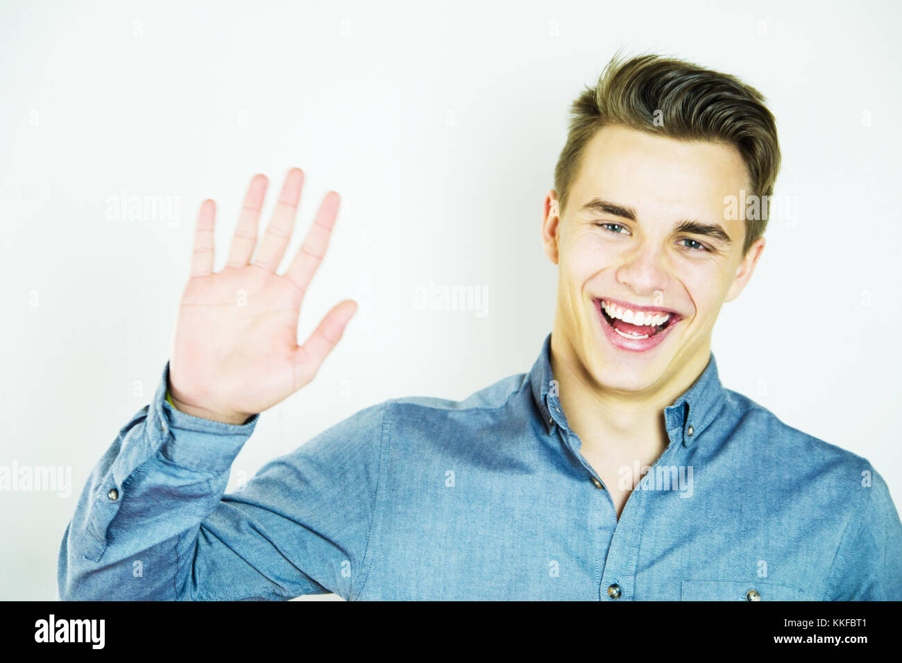 Boy waving goodbye hi-res stock photography and images - Alamy