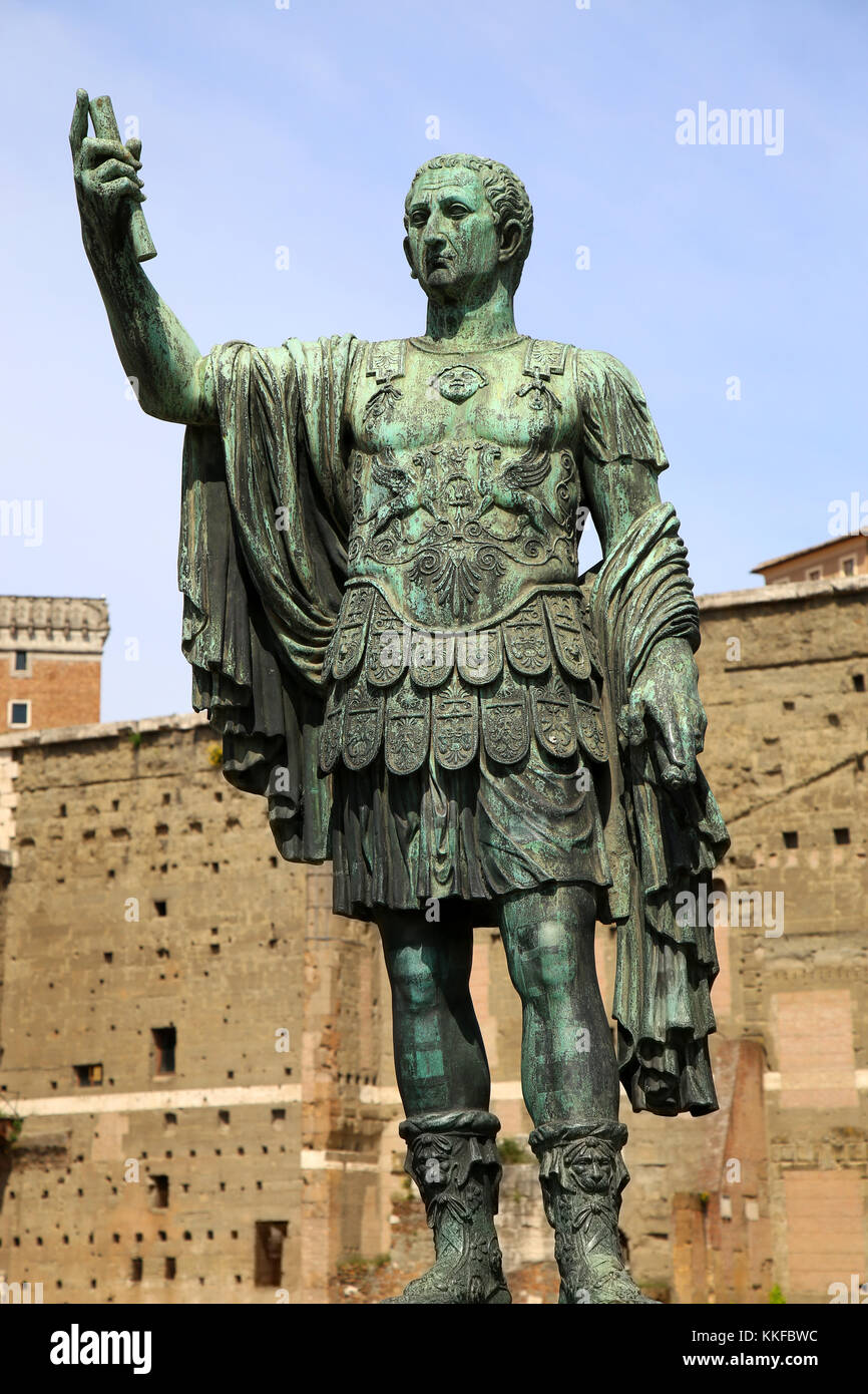 Statue S.P.Q.R. IMP.CAESARI NERVAE Augustus on street Via dei Fori ...