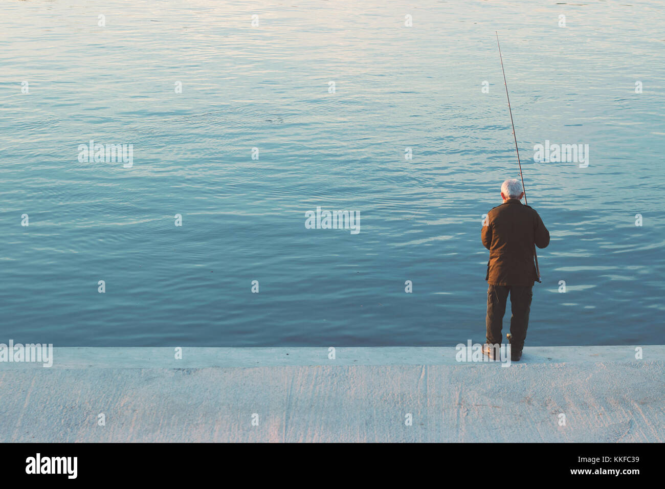 Old men fishing hi-res stock photography and images - Alamy