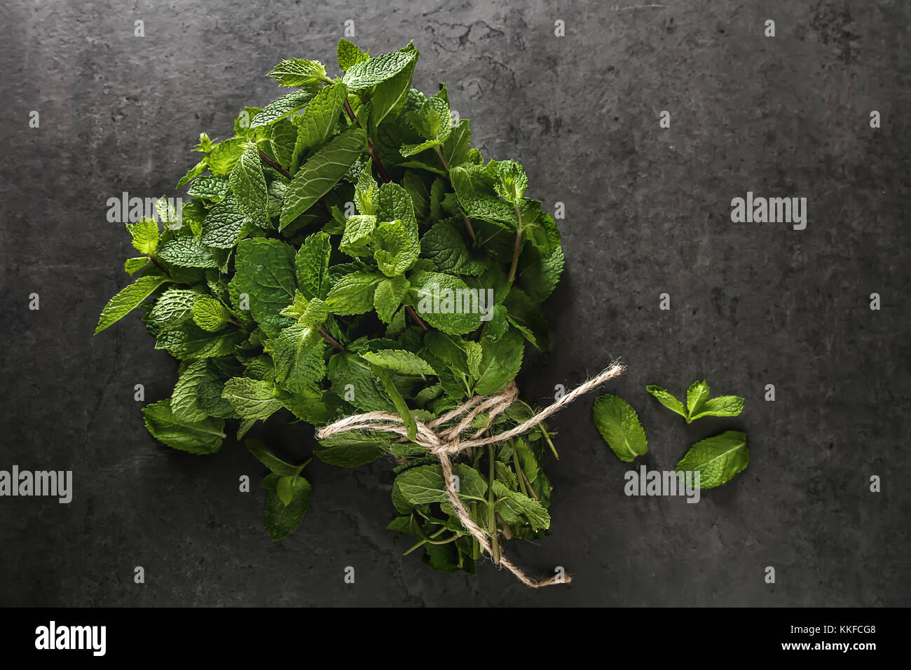 Fresh mint leaves. Italian herbs. Dark background Stock Photo - Alamy