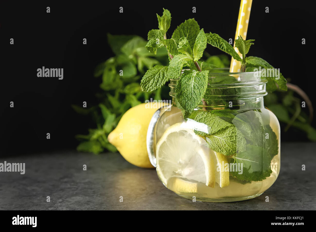 Fresh mint leaves in tea. Italian herbs. Dark background Stock Photo ...