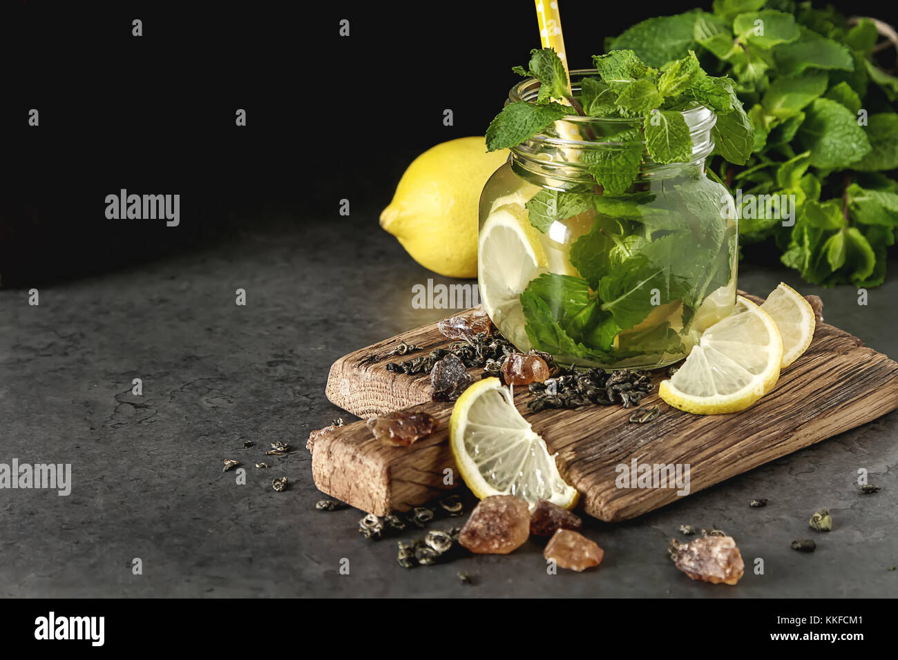 Fresh mint leaves in tea. Italian herbs. Dark background Stock Photo ...