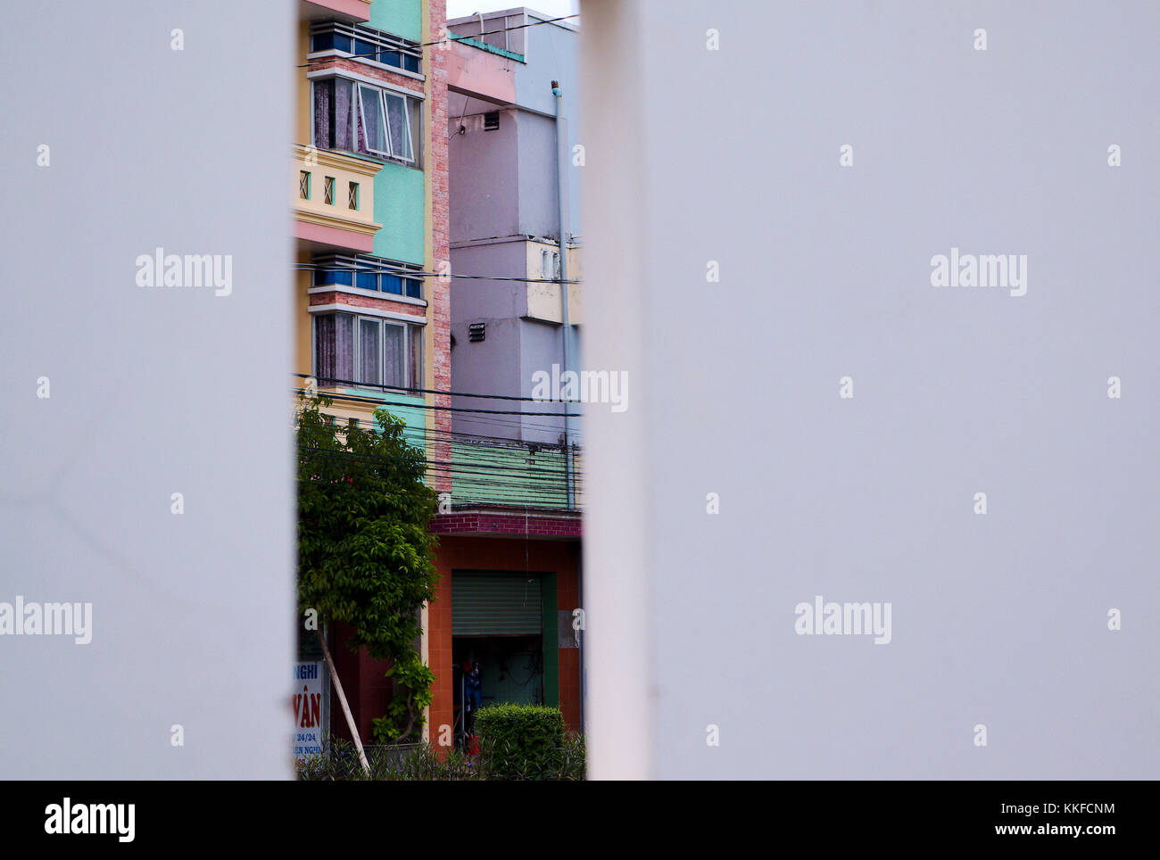 Building between walls Stock Photo - Alamy