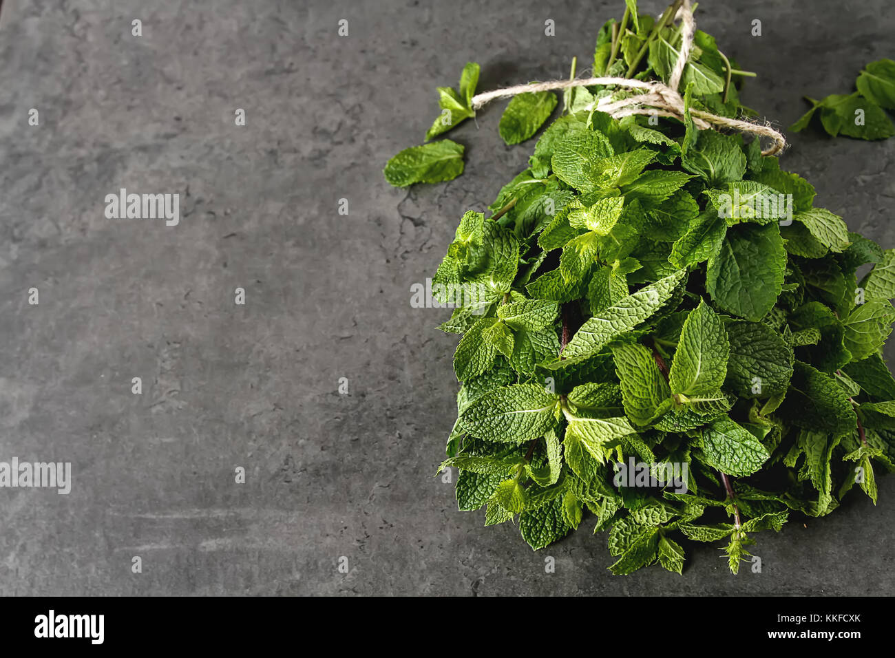 Fresh mint leaves. Italian herbs. Dark background Stock Photo - Alamy