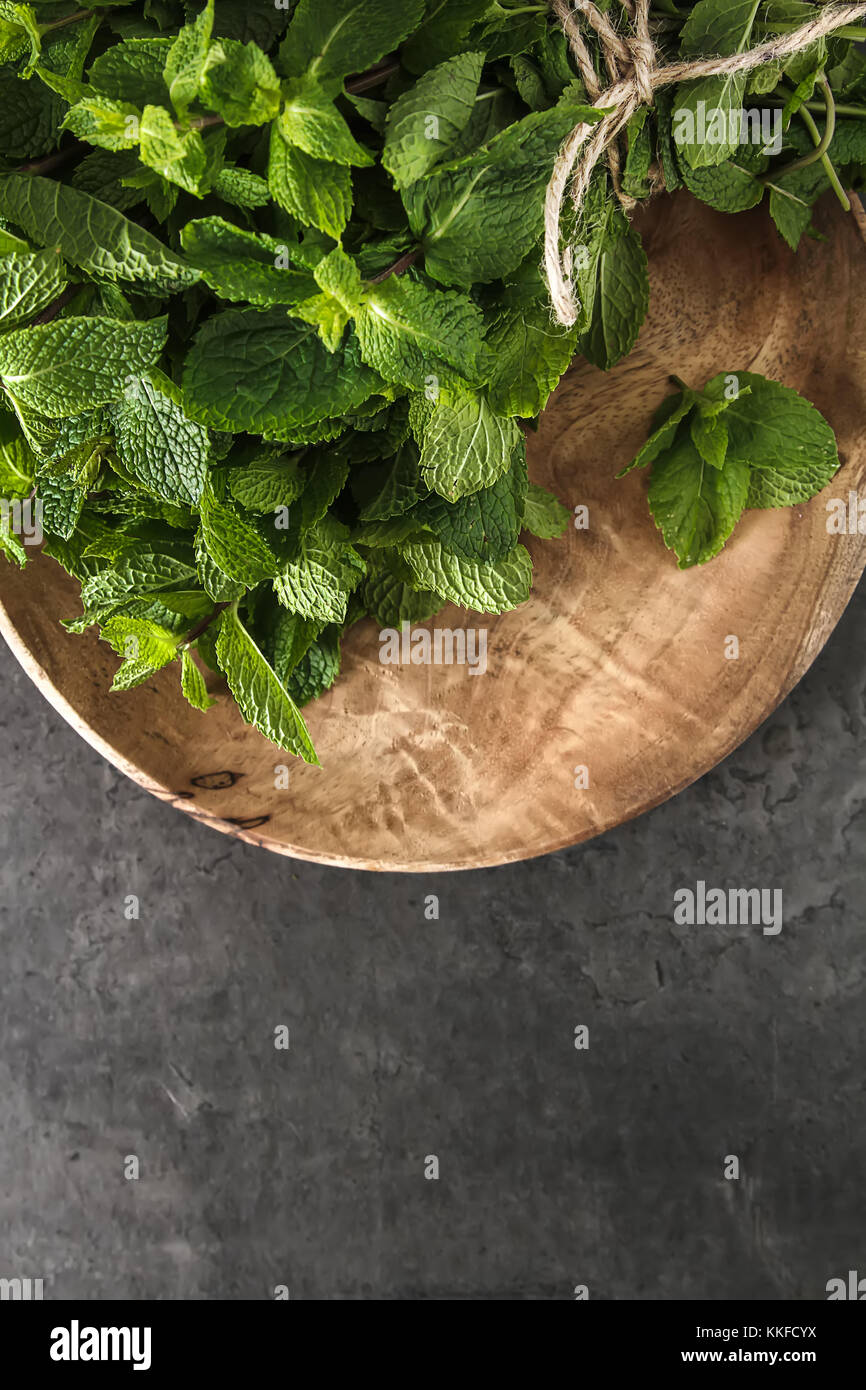 Fresh mint leaves. Italian herbs. Dark background Stock Photo - Alamy