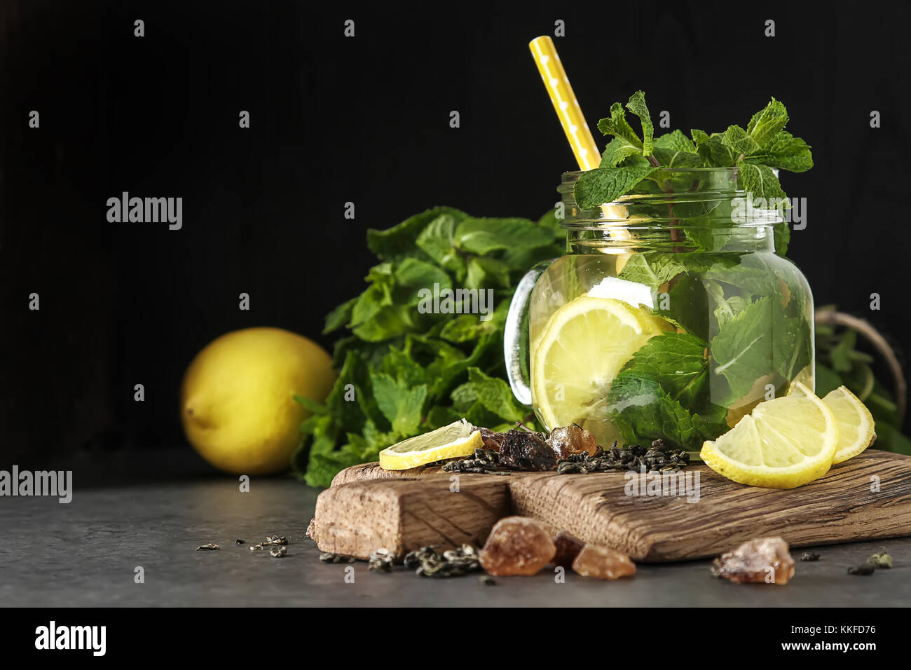 Fresh mint leaves in tea. Italian herbs. Dark background Stock Photo ...