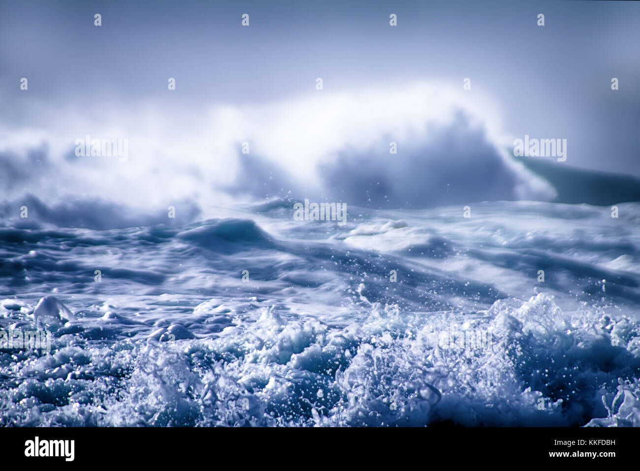 Impressive storm on Pacific coast. Wind blows spray from wave crest ...