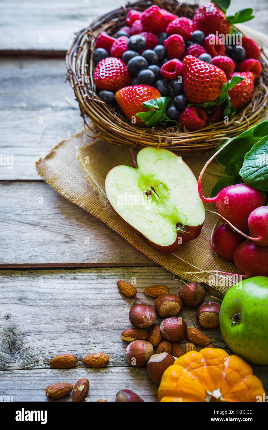 Fruits and vegetables on rustic background Stock Photo - Alamy