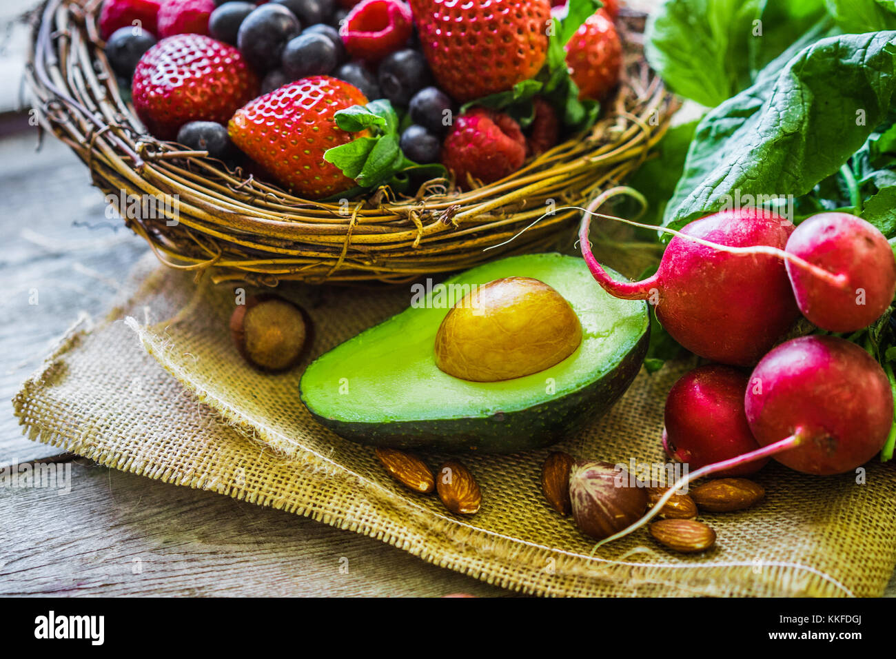Fruits and vegetables on rustic background Stock Photo - Alamy