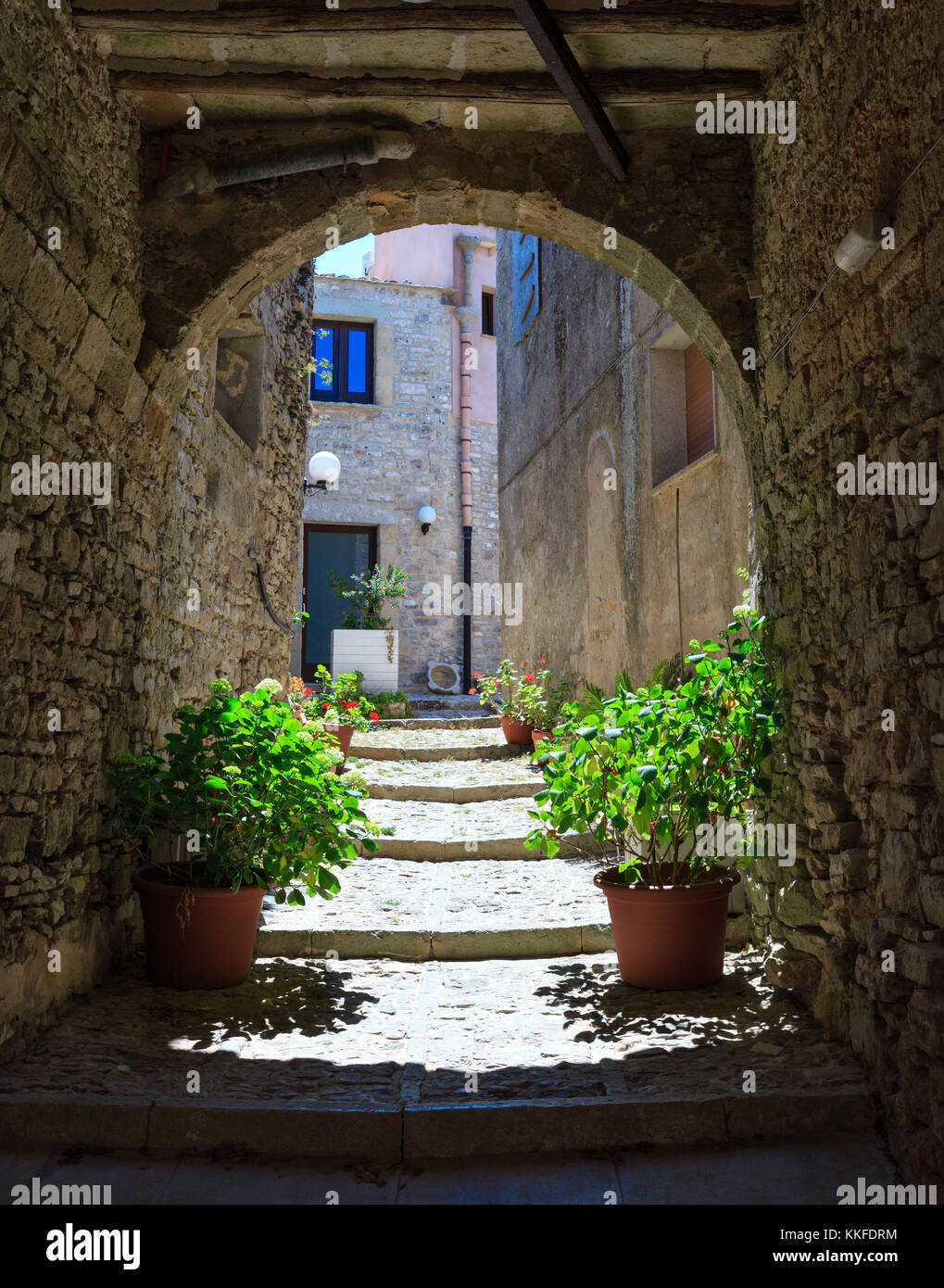 Street view of the old medieval Erice town, Trapani region, Sicily ...