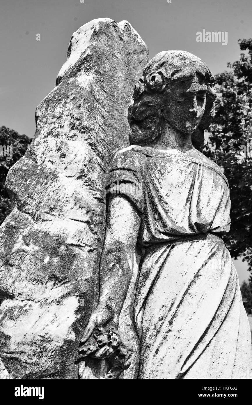The somber statue of a young girl who, in her innocence, was known as a ...