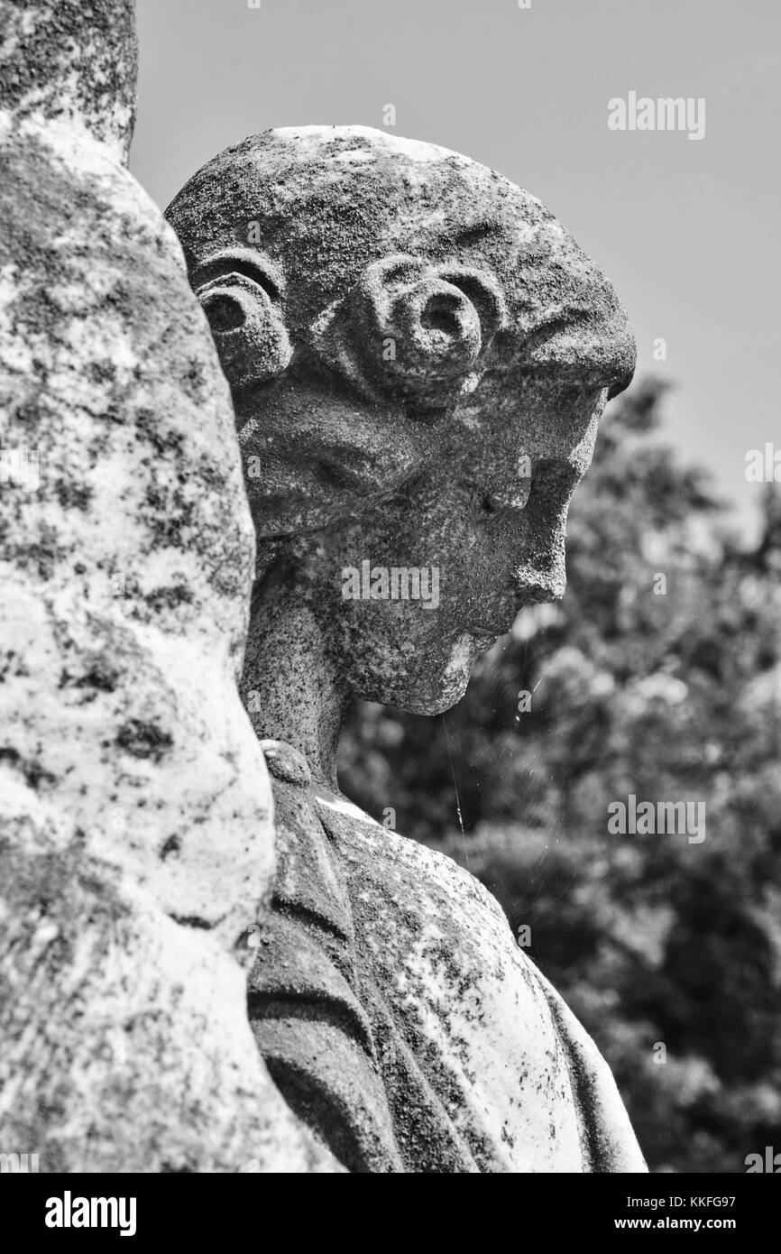 The somber statue of a young girl who, in her innocence, was known as a ...