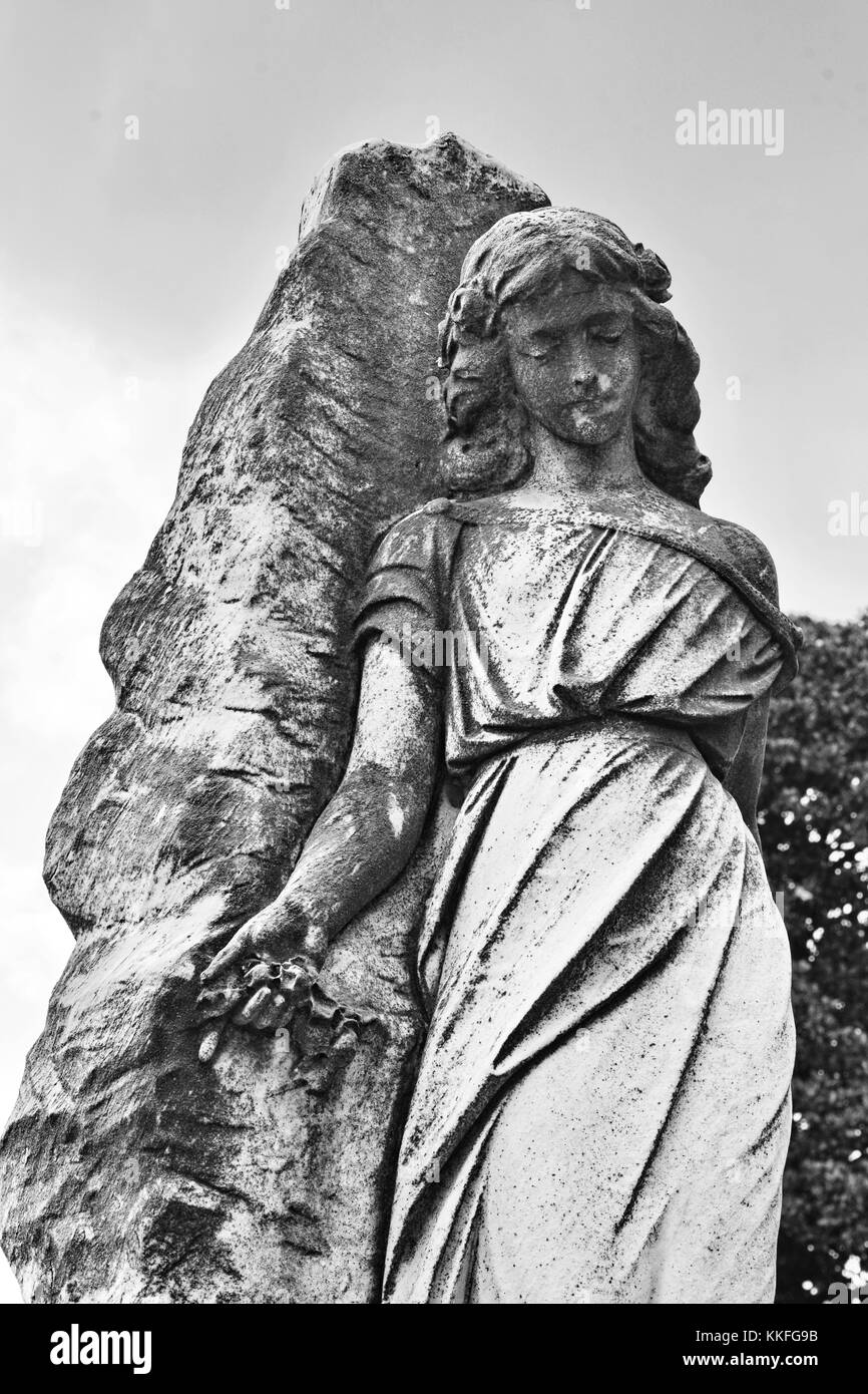 The somber statue of a young girl who, in her innocence, was known as a ...