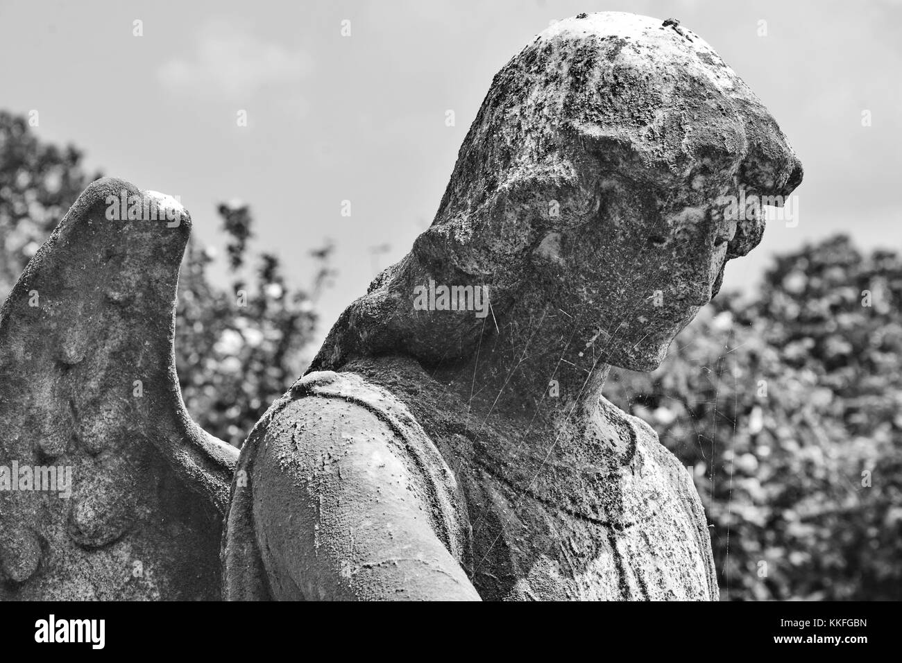 The Archangel Gabriel rendered in stone atop a grave in historic ...