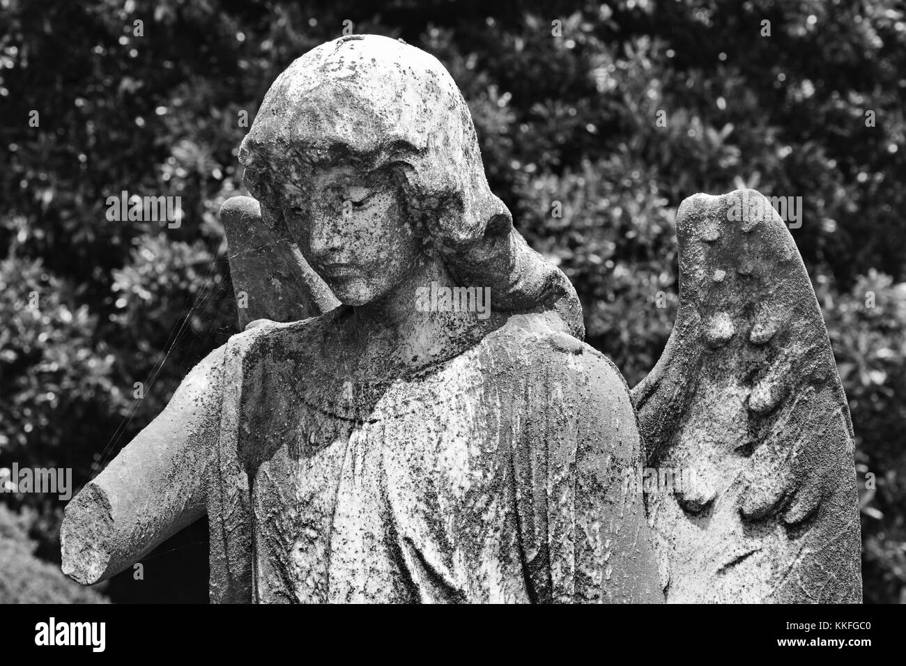 The Archangel Gabriel rendered in stone atop a grave in historic ...